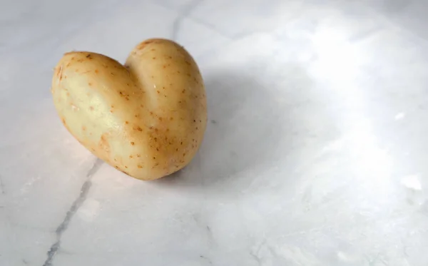 Rotten heart shaped potatoes Stock Photos, Royalty Free Rotten heart ...