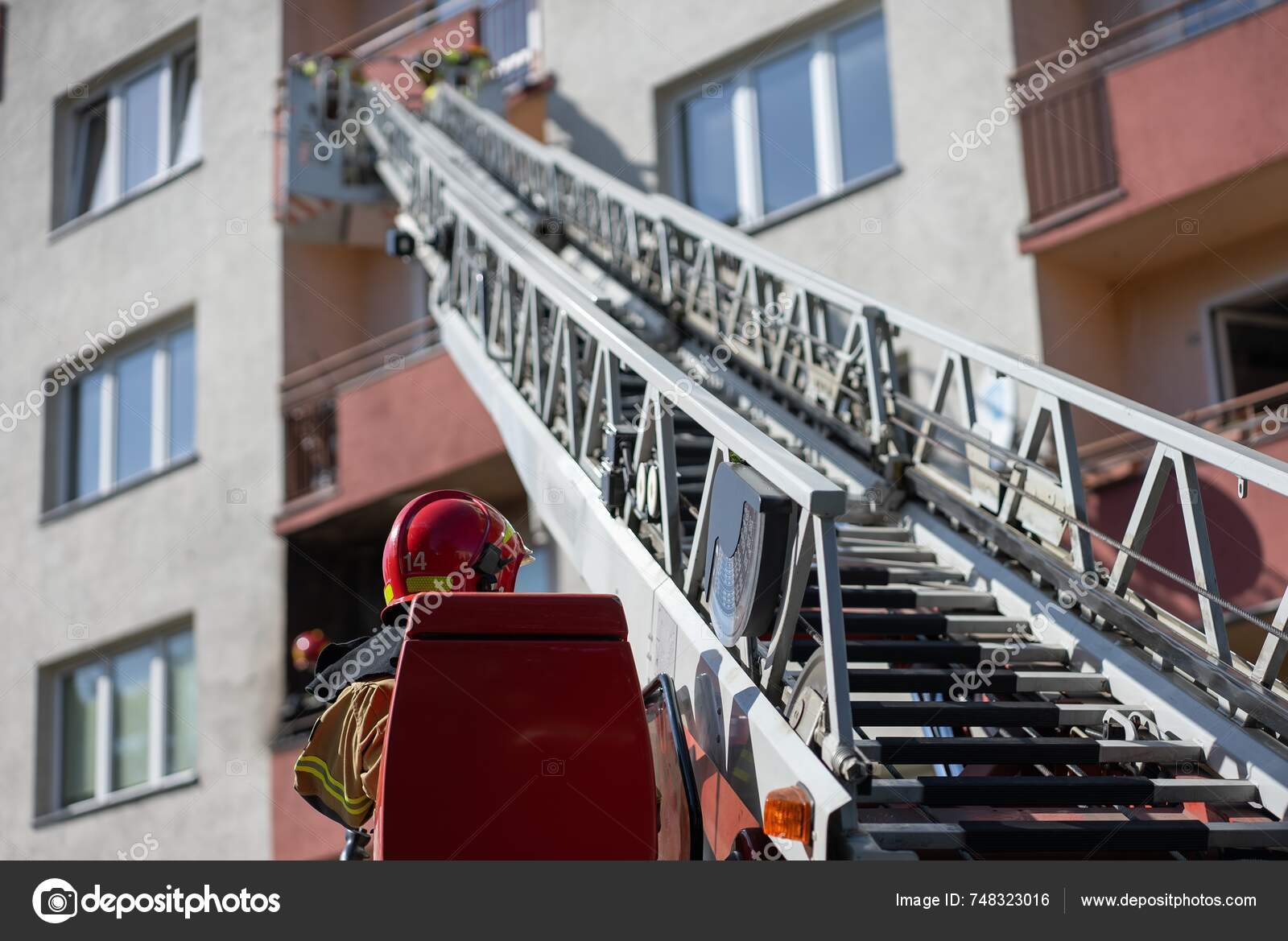 Operator Fire Truck Extended Elevated Ladder Reaches Residential ...
