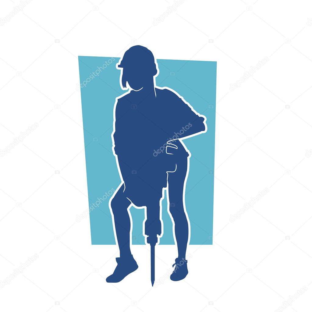 Silueta de una trabajadora de la construcción que lleva la máquina ...