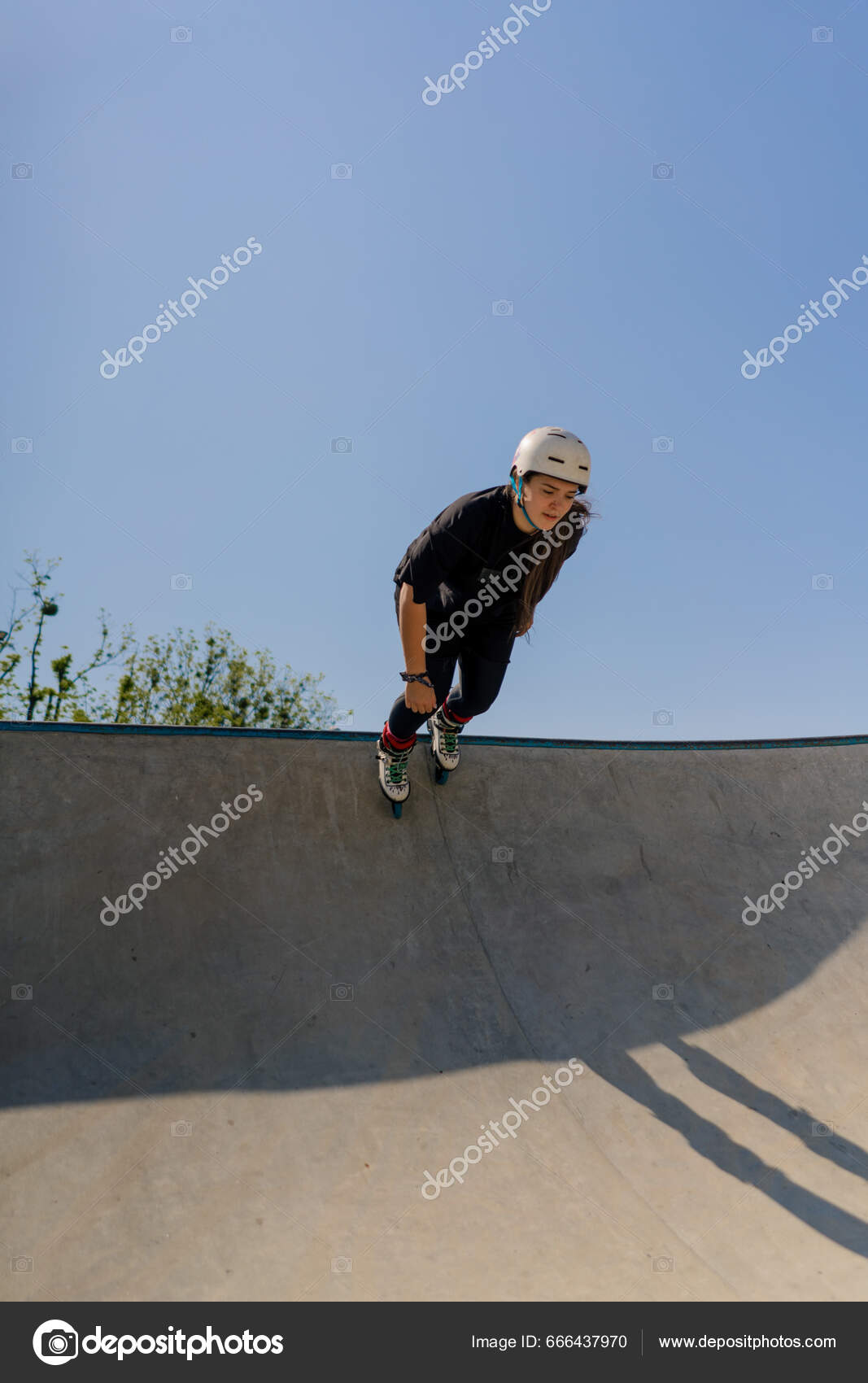 Young Skilled Woman Rollerblading Jumping Ramp Skate Park Practicing ...