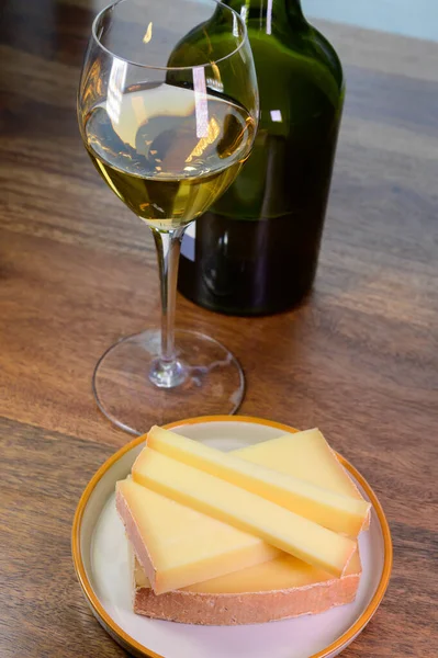 Wine and cheese pairing, local Comte cheese produced in the Franche ...