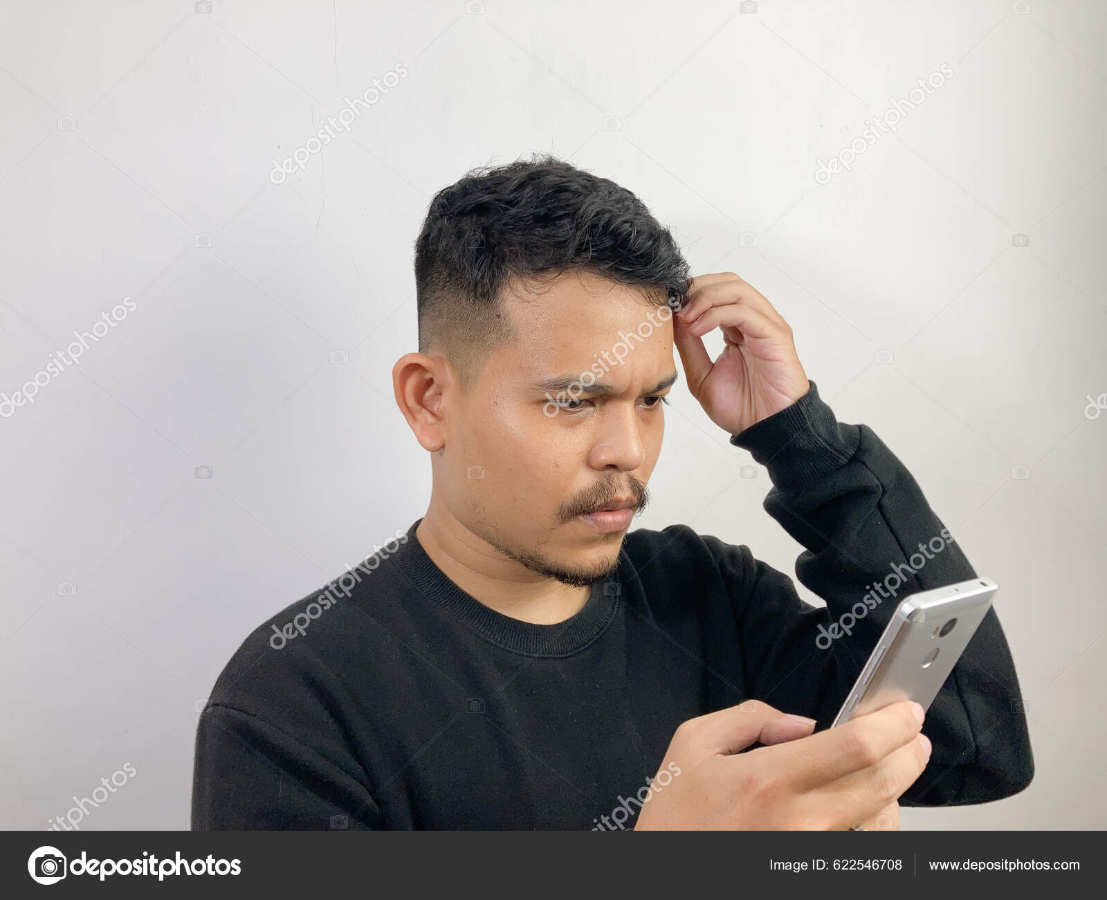 Young Asian Man Shows Confused Face While Looking Bad News — Stock ...