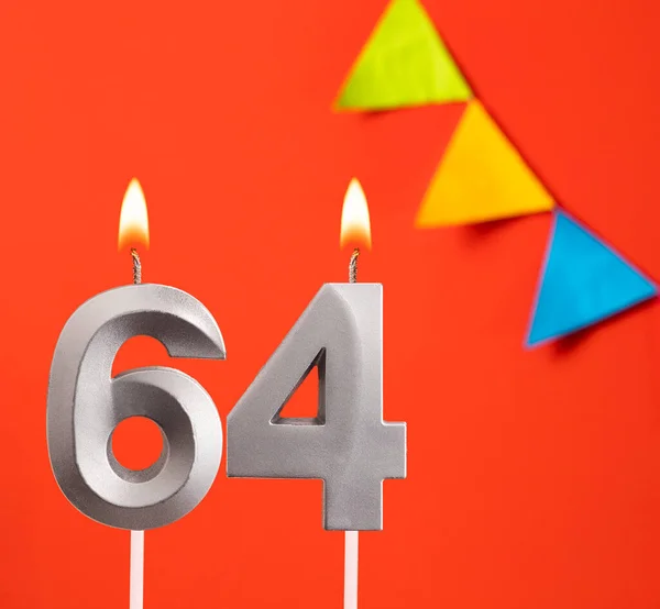 Birthday card - Number 64 candle in orange background - Stock Image ...