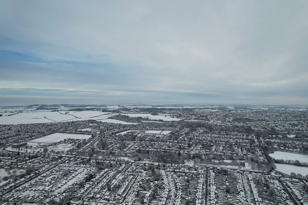 High angle view of Snow covered North Luton's landscape and Cityscape ...
