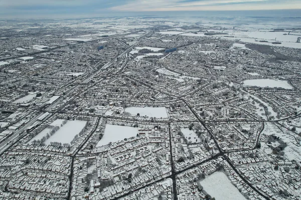 High angle view of Snow covered North Luton's landscape and Cityscape ...