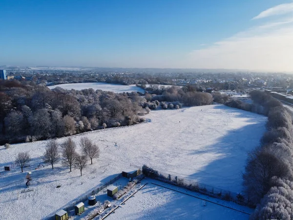 High angle view of Snow covered North Luton's landscape and Cityscape ...