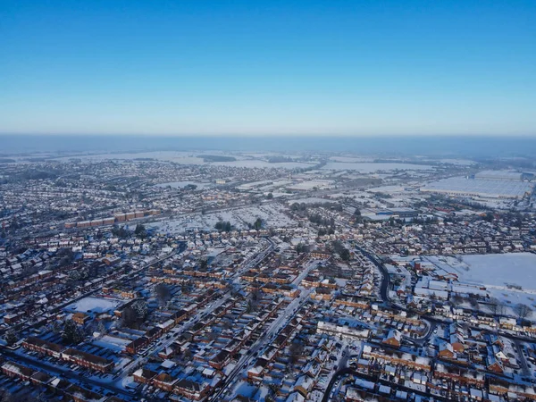 High angle view of Snow covered North Luton's landscape and Cityscape ...