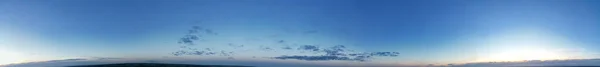 Ultra Wide Panoramic View of Sky and Clouds During Sunset over England ...
