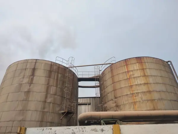 low-angle view of huge storage tank with heat isolation for high ...