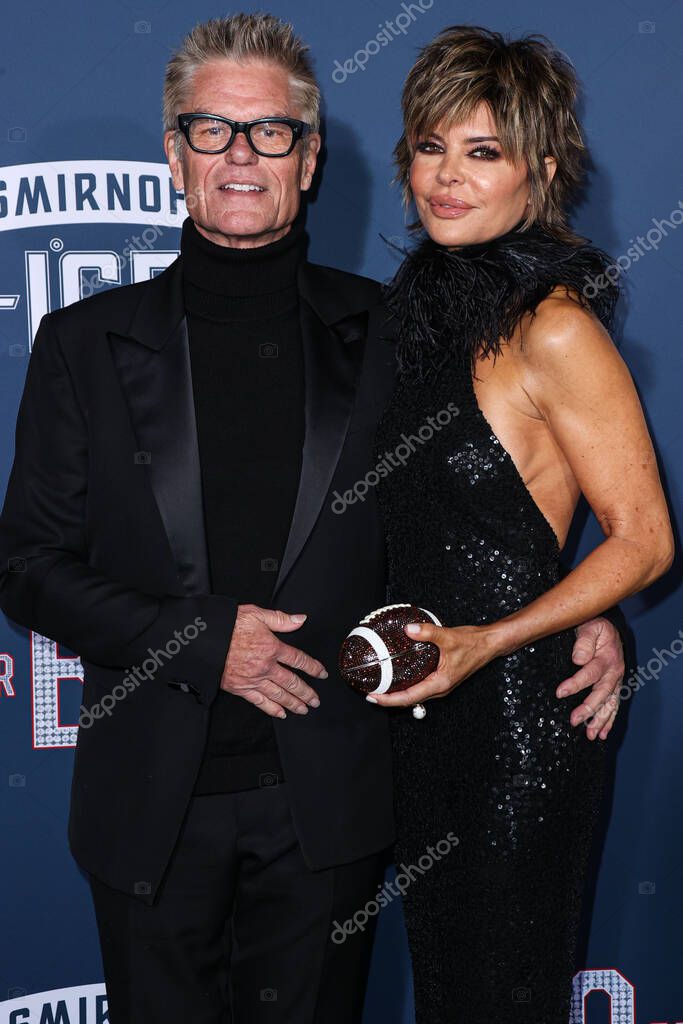 Harry Hamlin and wife Lisa Rinna arrive at the Los Angeles Premiere ...