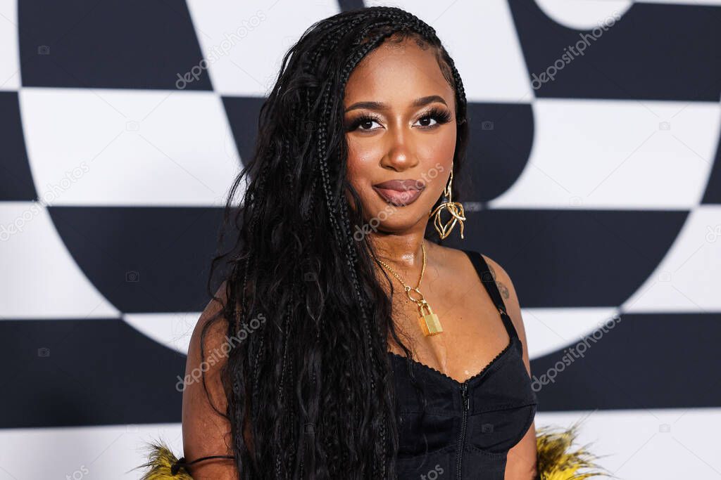 Baby Tate arrives at the Warner Music Group Pre-Grammy Party 2023 held ...