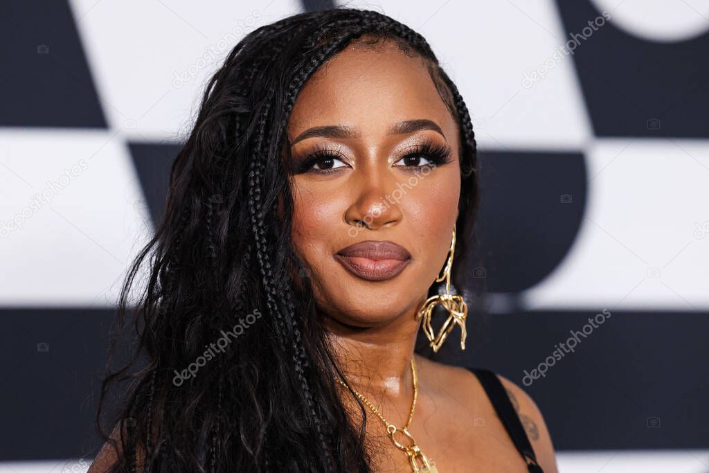 Baby Tate arrives at the Warner Music Group Pre-Grammy Party 2023 held ...