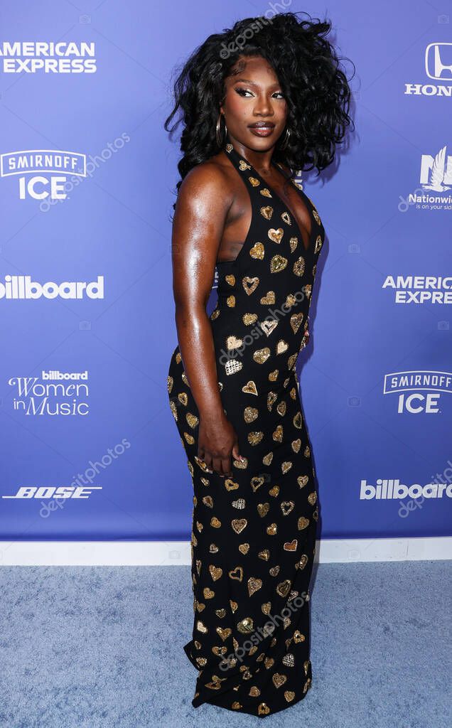 Doechii arrives at the 2023 Billboard Women In Music held at the ...