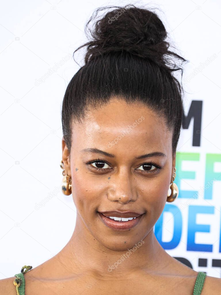 Taylour Paige wearing an Acne Studios dress arrives at the 2023 Film ...