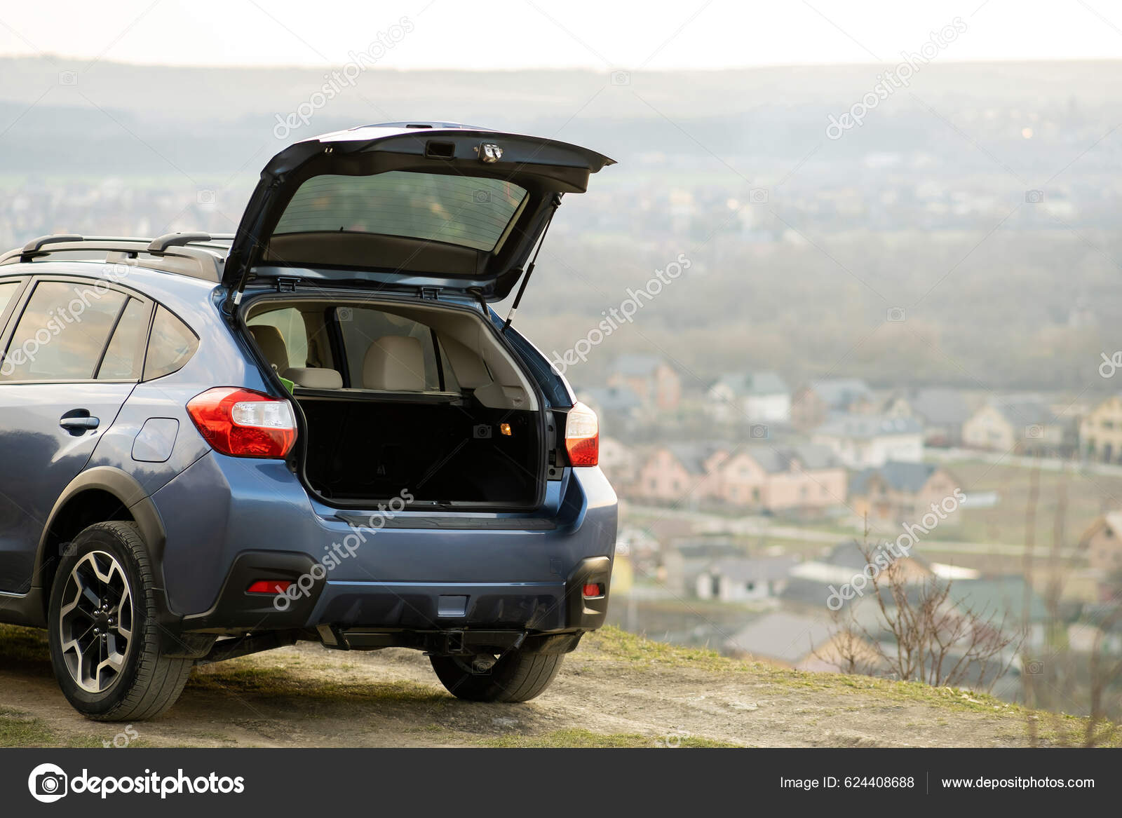 Blue Road Car Open Trunk Lid Dawn Grassy Hill Distant — Stock Photo ...