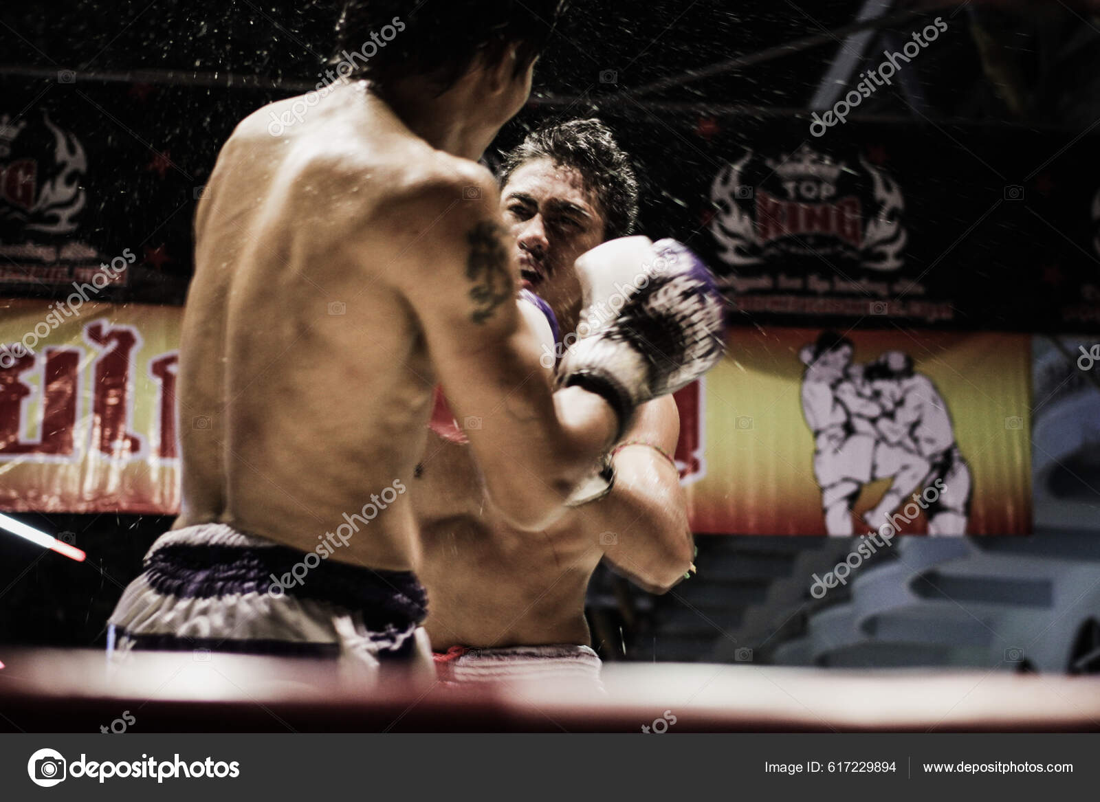 Two Shirtless Muscular Man Fighting Kick Boxing Combat Boxing Ring ...