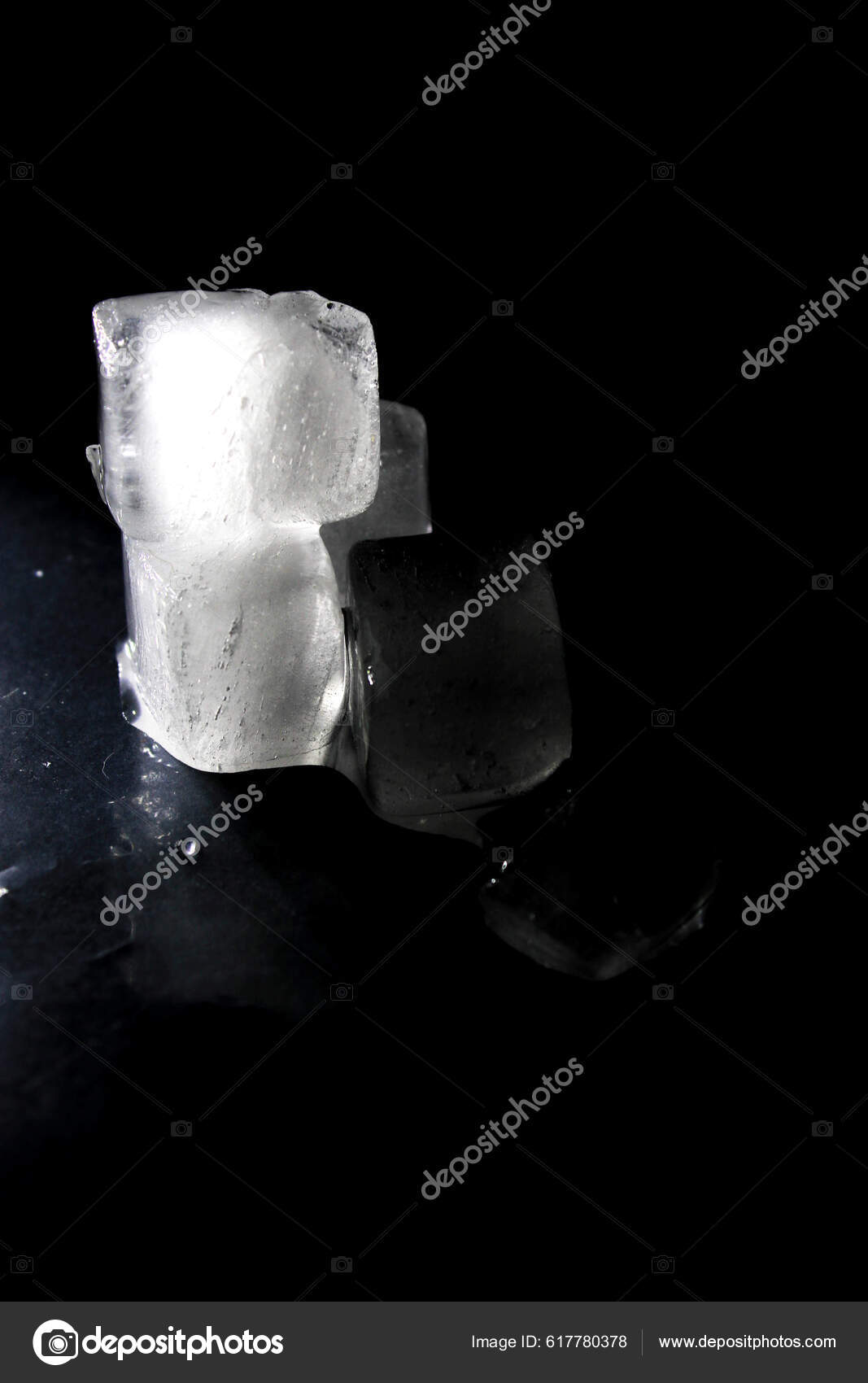 Ice Cubes Dark Background Stock Photo by ©YAY_Images 617780378