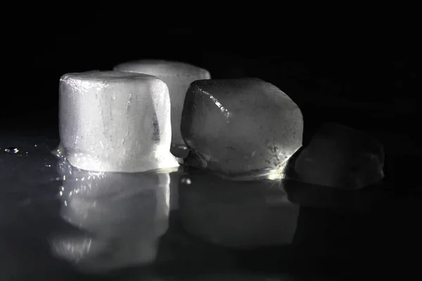 Ice Cubes Dark Background Stock Photo by ©YAY_Images 617780378