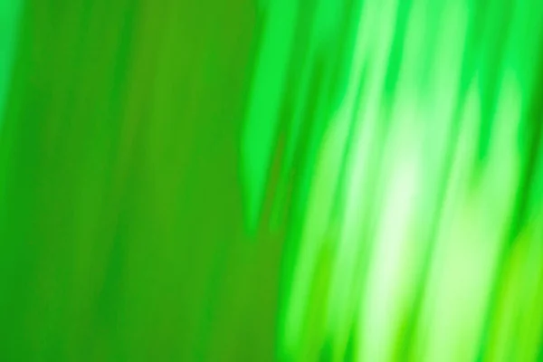 Slow shutter speed with motion green blur effect. Decorative green ...