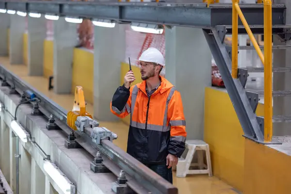 Rail maintenance engineer assessing condition of infrastructure ...