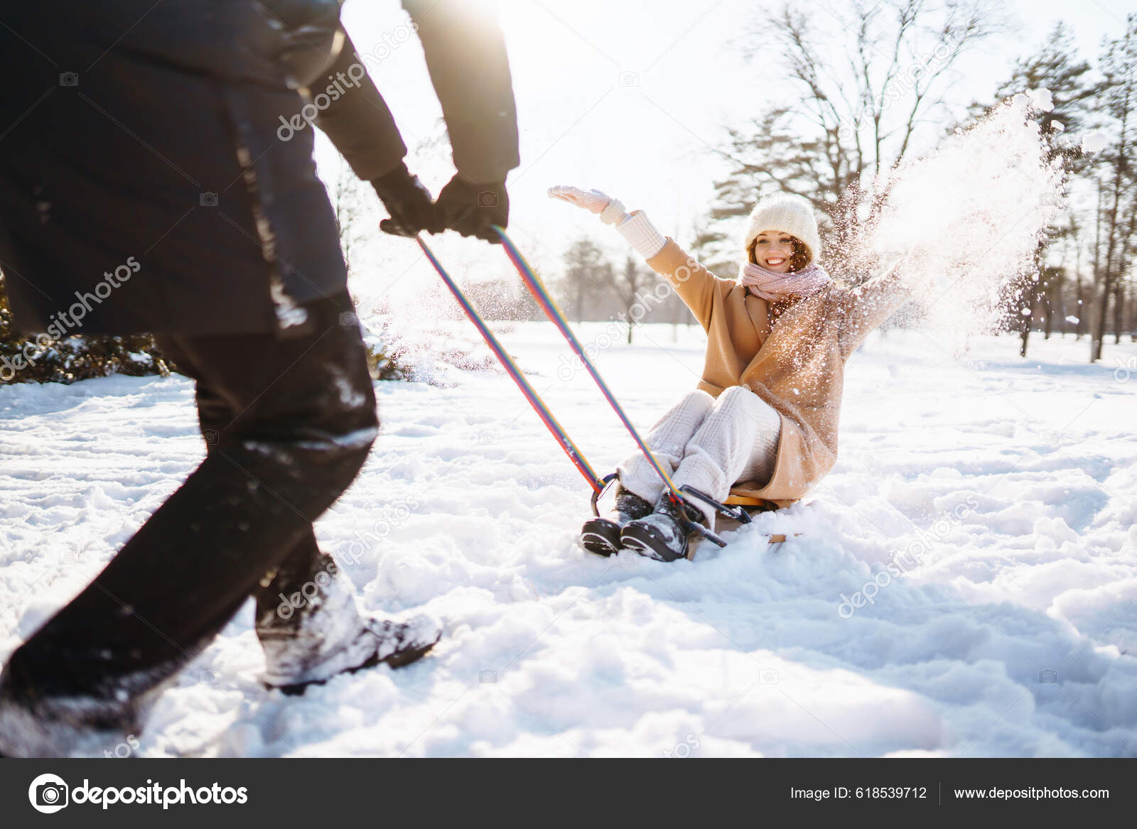 Man Rolls Woman Sled Winter Snowy Forest Cold Weather Holidays Stock ...