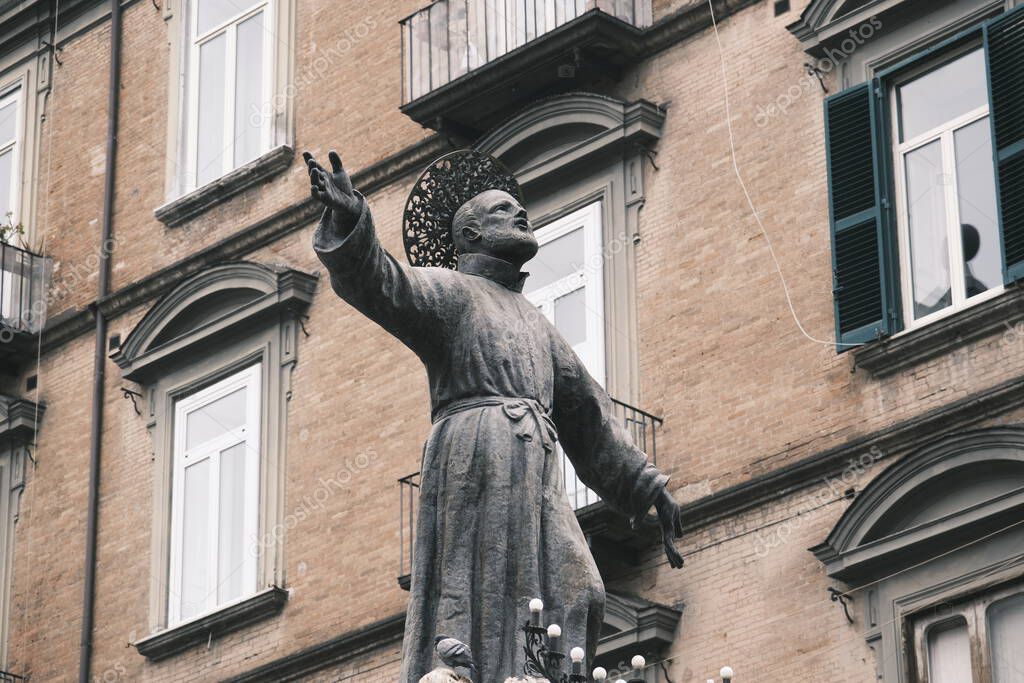 Bronze statue of San Gaetano da Thiene imploring the sky placed in the ...