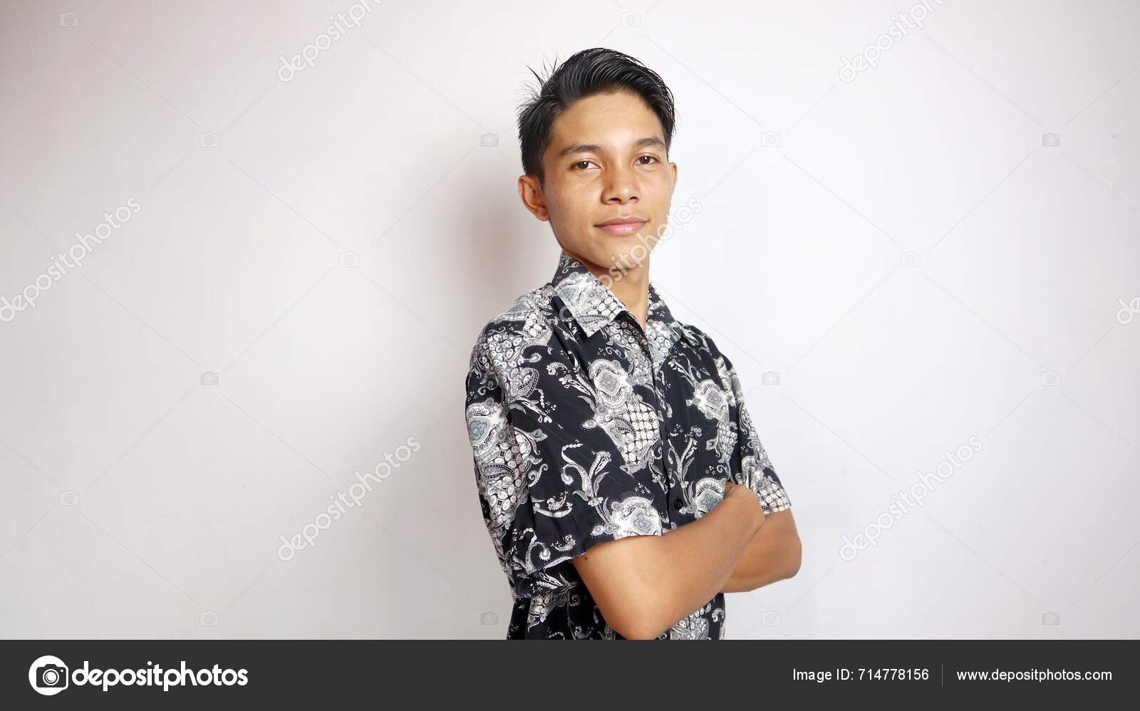 Smiling Young Handsome Asian Man Wearing Batik Shirt Posing Crossed ...