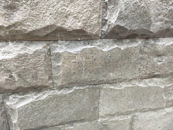 natural stone tiles that are mounted on the wall, look a little shiny ...