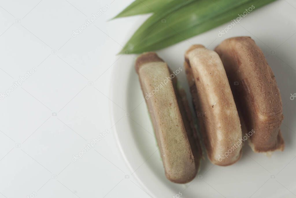 Kue Pukis with an isolated white background. These traditional ...