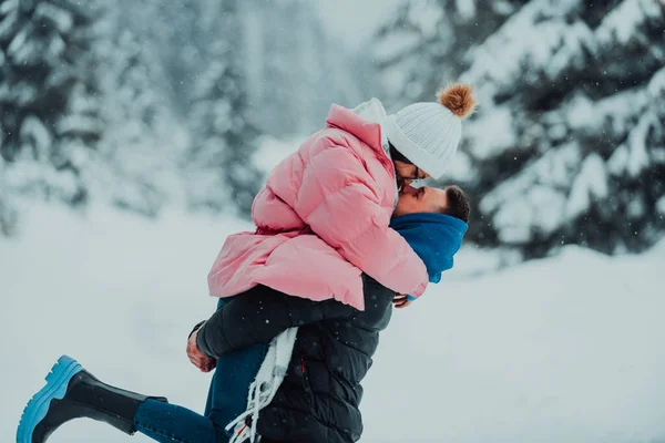 Couple in love in the snow Stock Photos, Royalty Free Couple in love in ...