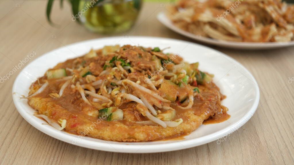 Tahu Telor or Egg Tofu is a traditional food from Surabaya city ...