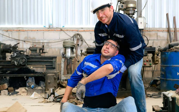Engineer worker with accident at factory, Worker with injury from ...