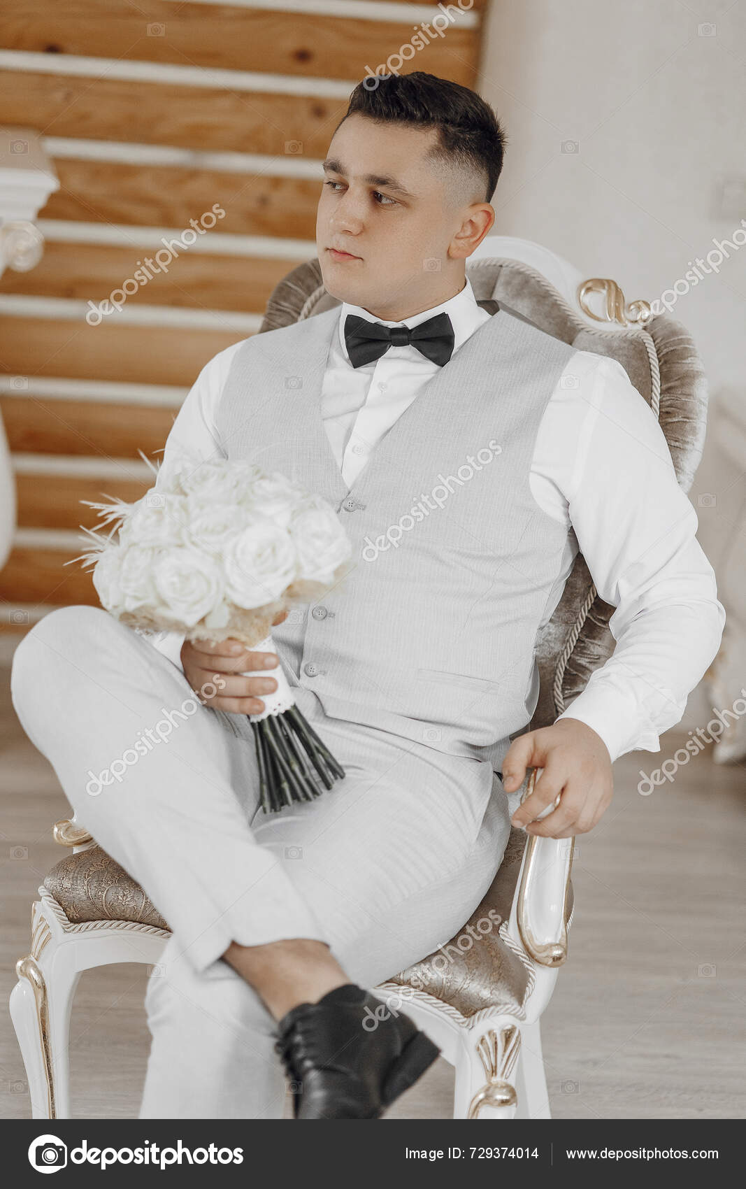 Man White Shirt Black Bow Tie Sits Chair Holding Bouquet — Stock Photo ...
