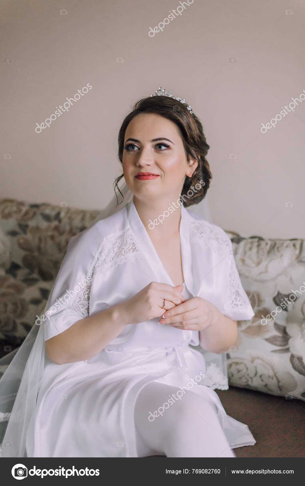 Woman White Robe Sits Couch She Wearing White Veil Ring — Stock Photo © Vasilij33 #769082760