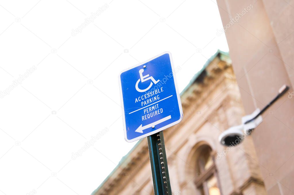 El signo de discapacidad es un símbolo azul y blanco de accesibilidad ...