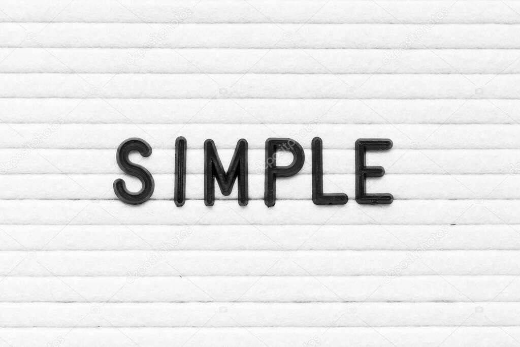 Black color letter in word simple on white felt board background 2023