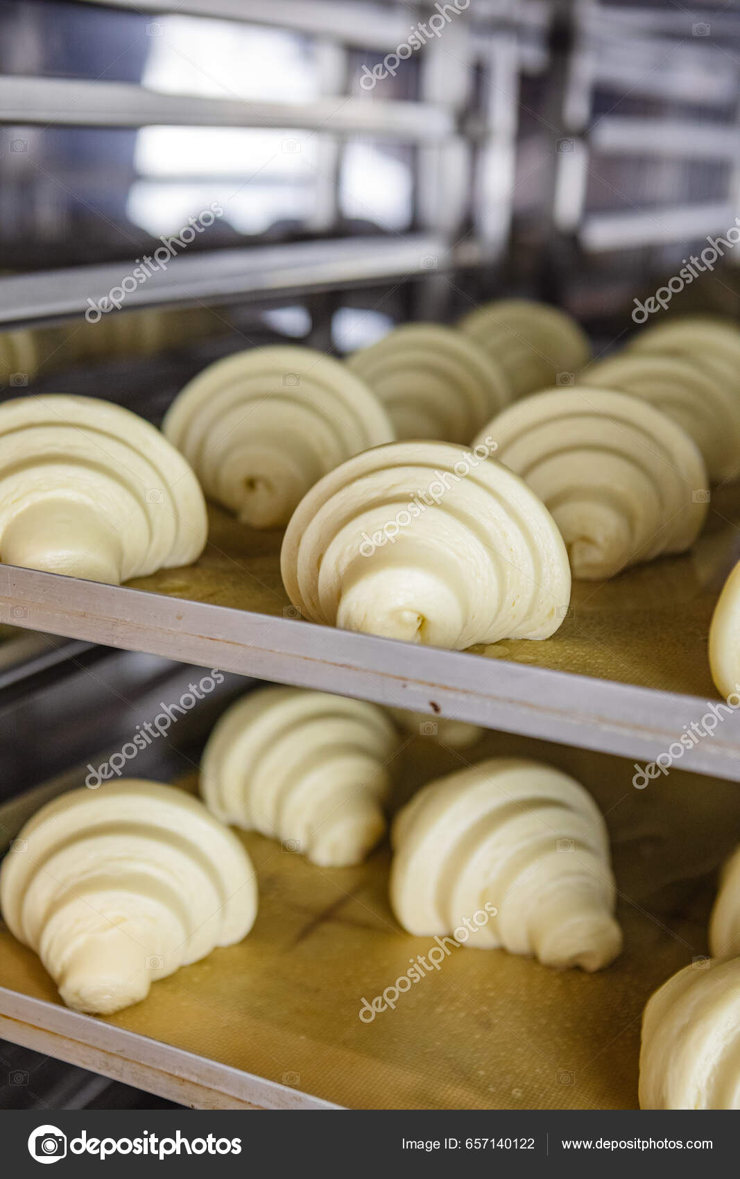 Pre Baked Proofed Croissant Dough — Stock Photo © Vera_Petrunina #657140122