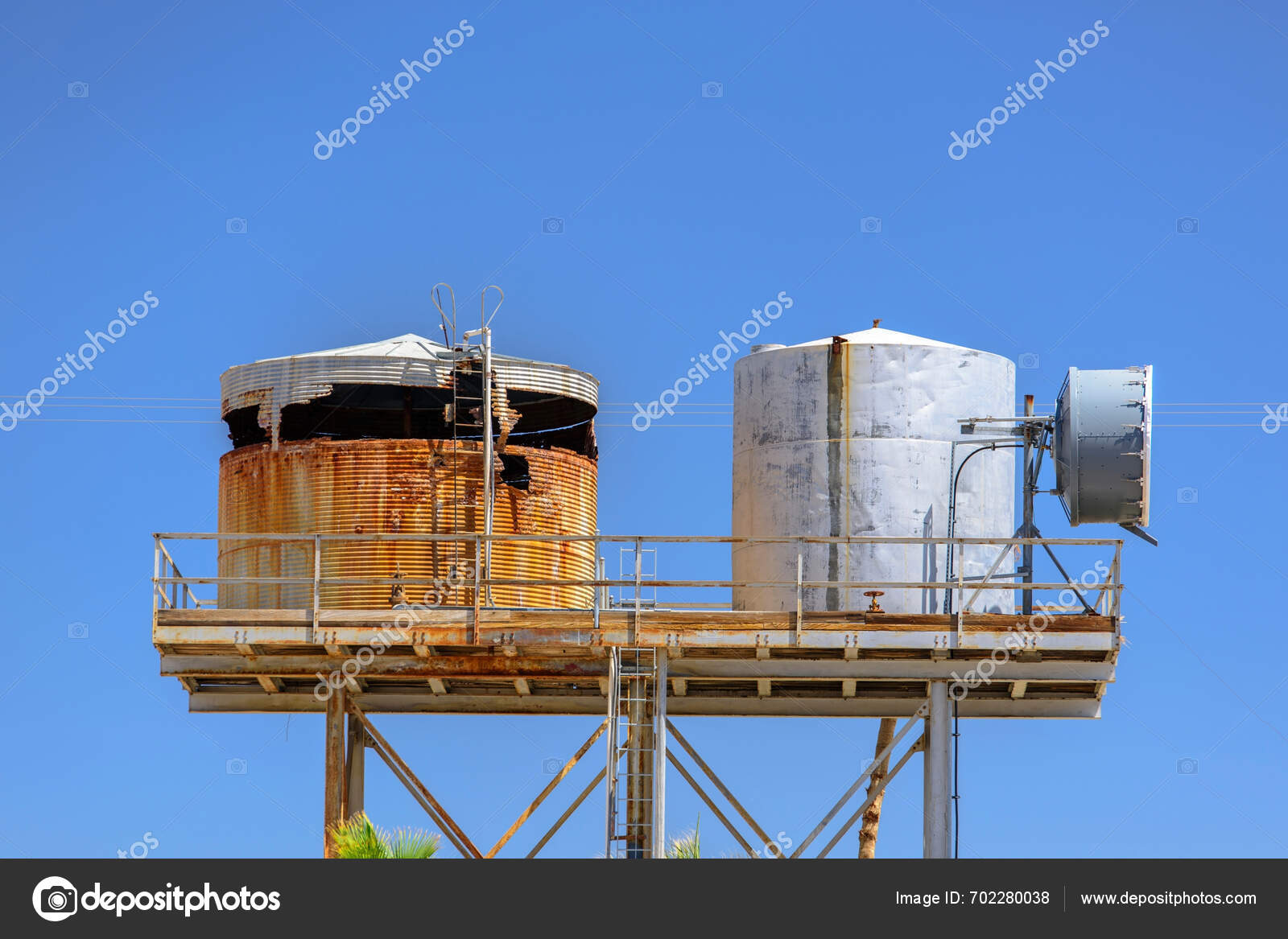 Rustic Relic Old Rusty Water Tower Ultra — Stock Photo © Only4K #702280038