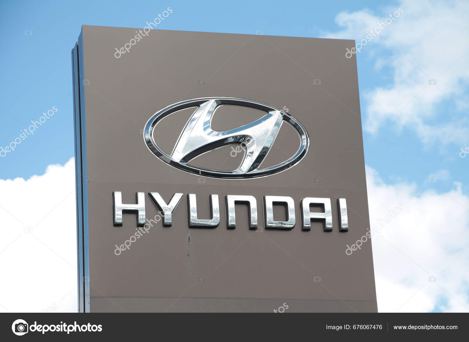 Hyundai Silver Logo Sign Gray Pillar Outdoors Exterior Clouds Sky ...