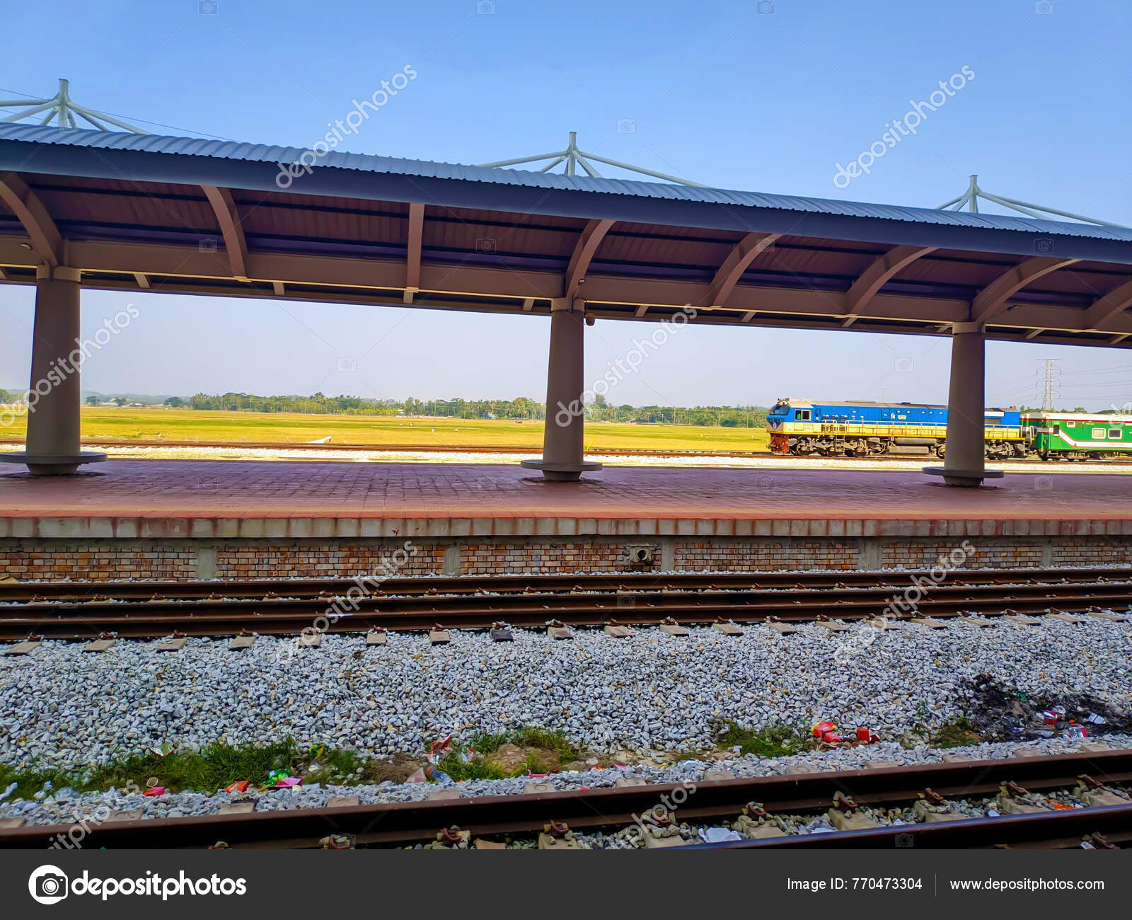 Image Shows Train Station Platform Blue Train Passing Platform Shaded ...