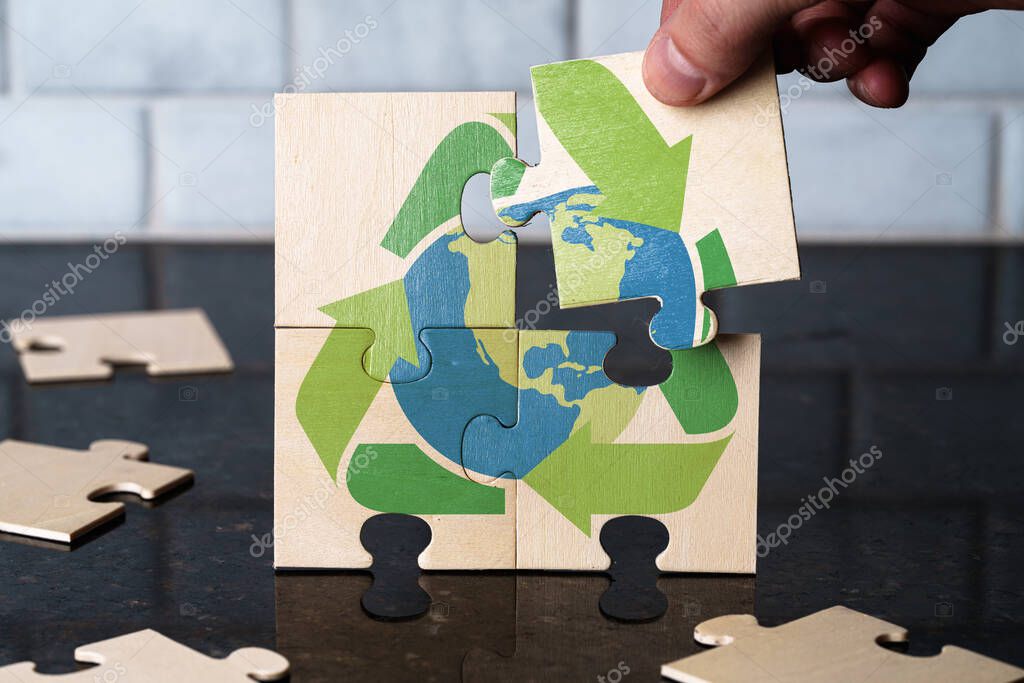 Reciclaje de piezas de rompecabezas que representan la sostenibilidad respetuosa con el medio ...