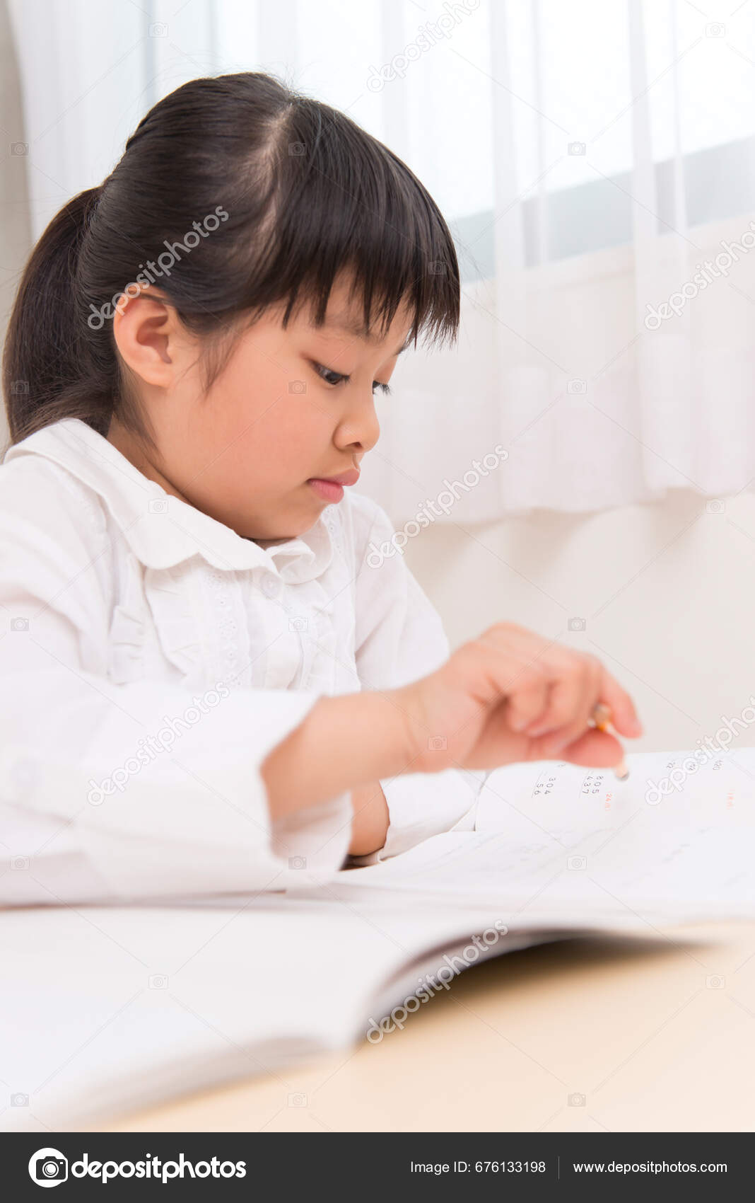 Little Asian Girl Doing Homework — Stock Photo © Paylessimages #676133198