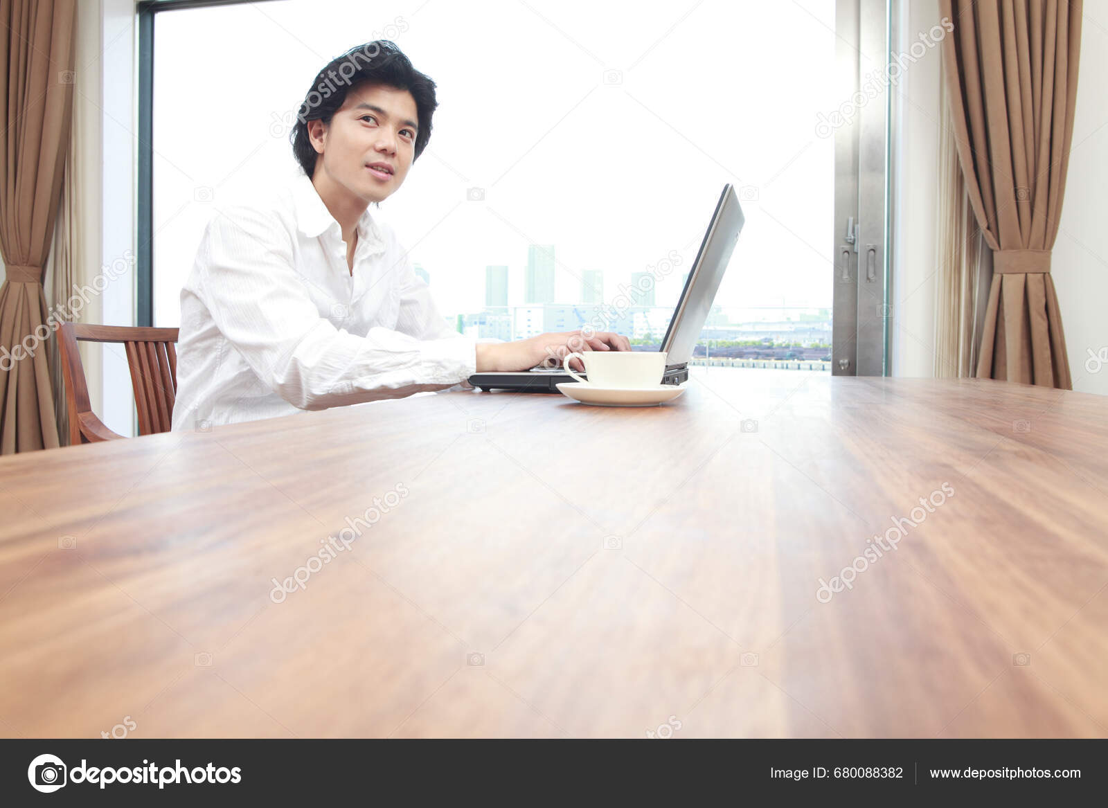 Man Sitting Table Laptop — Stock Photo © Paylessimages #680088382