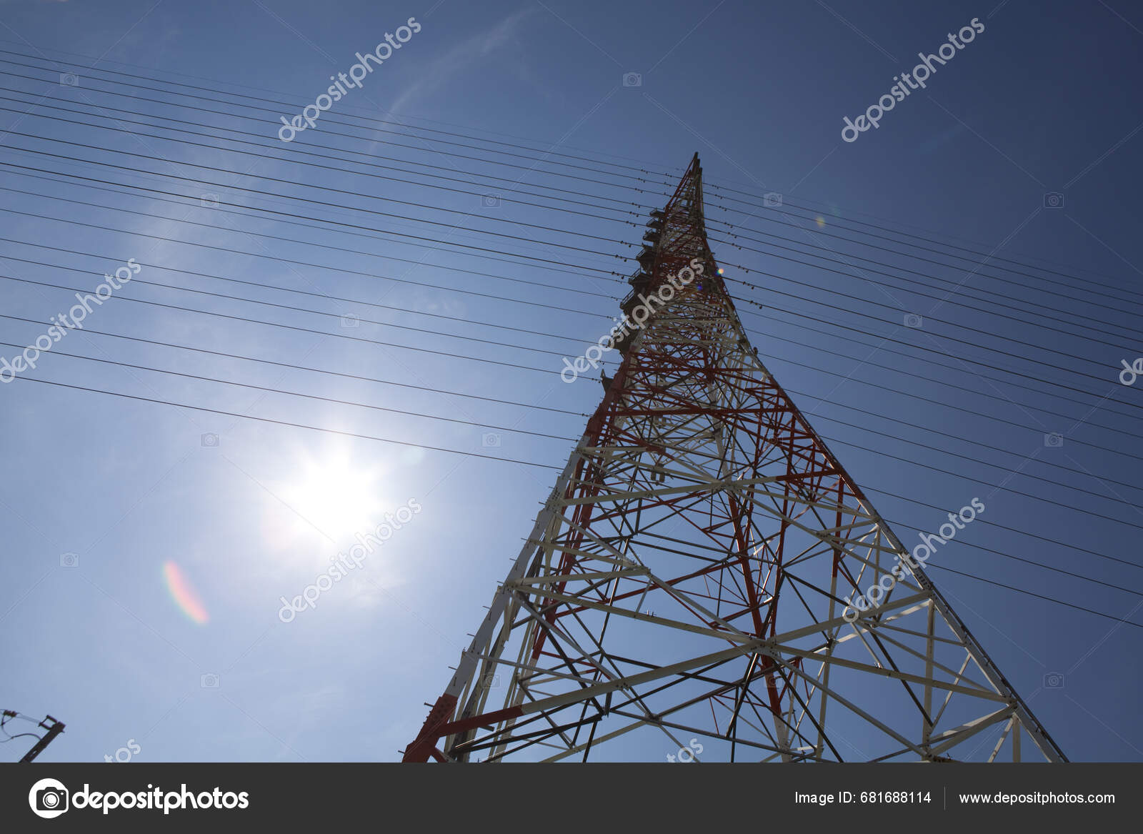 High Voltage Power Lines Blue Sky — Stock Photo © Paylessimages #681688114