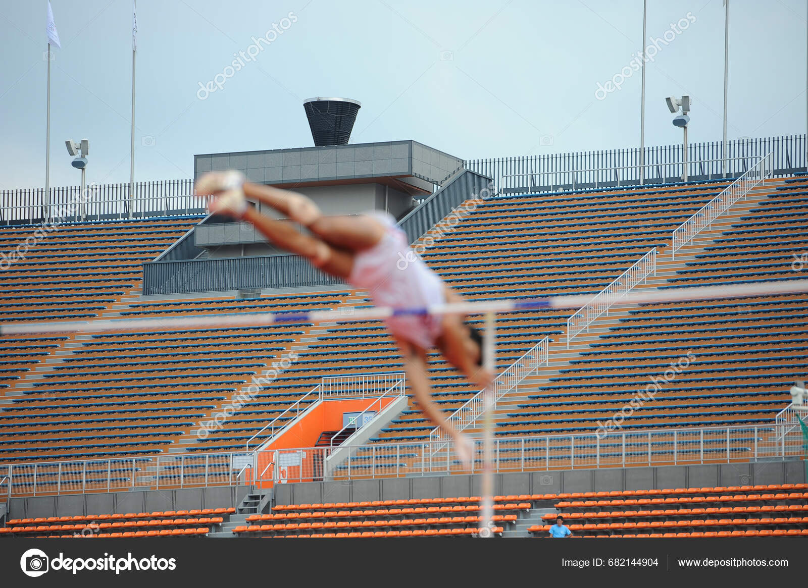 Male Japanese Athlete Performing High Jumps Stadium Daytime — Stock ...