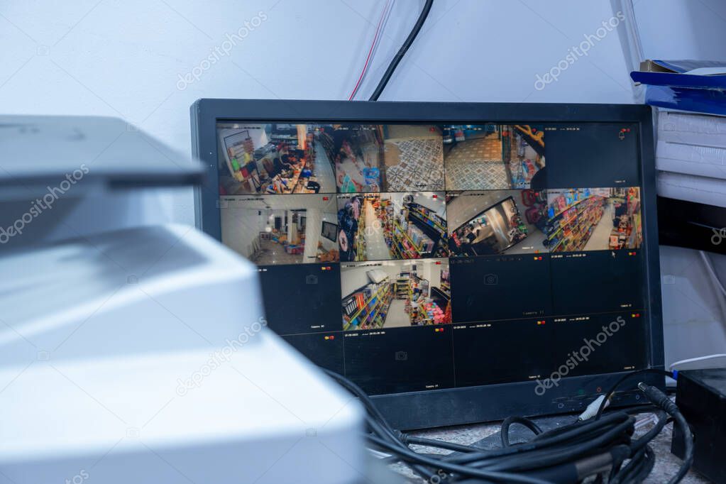 Playback CCTV cameras in office on computer screen. Surveillance ...