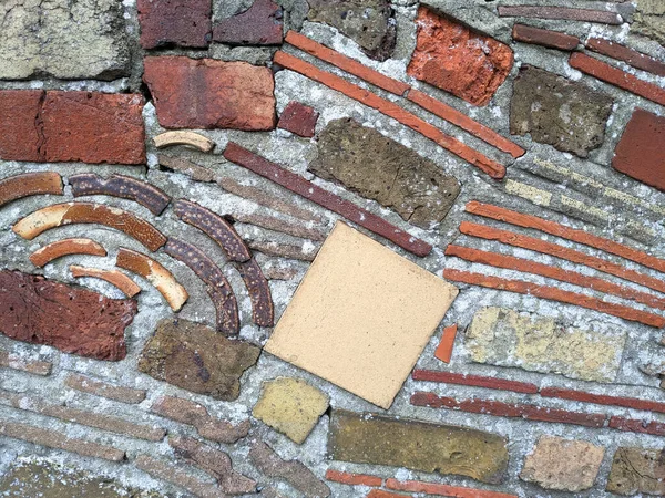 A Decorative Brick Wall Design with Lines and Swirls Clay Abstract ...