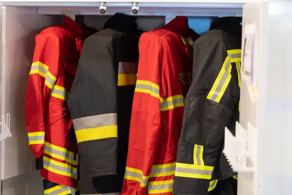 Firefighter uniforms Stock Photos, Royalty Free Firefighter uniforms ...