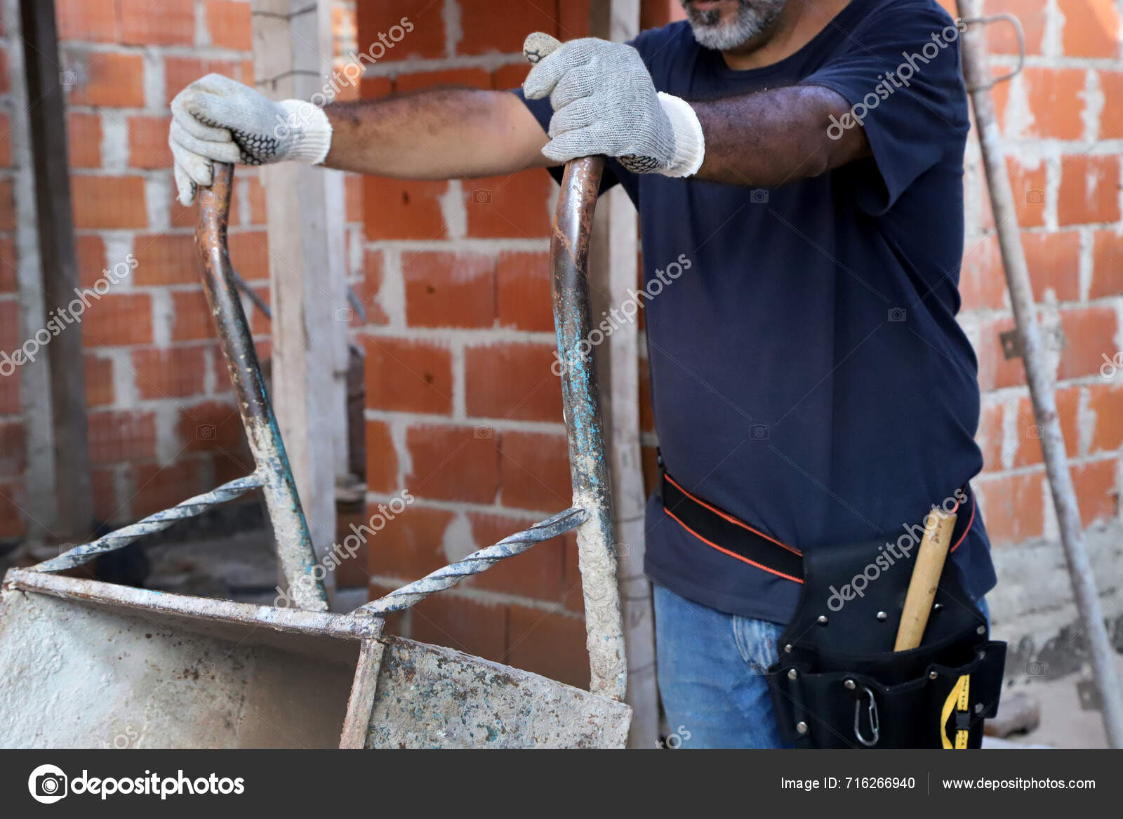 Bricklayer Unloading Wheelbarrow Construction Site Construction Worker ...