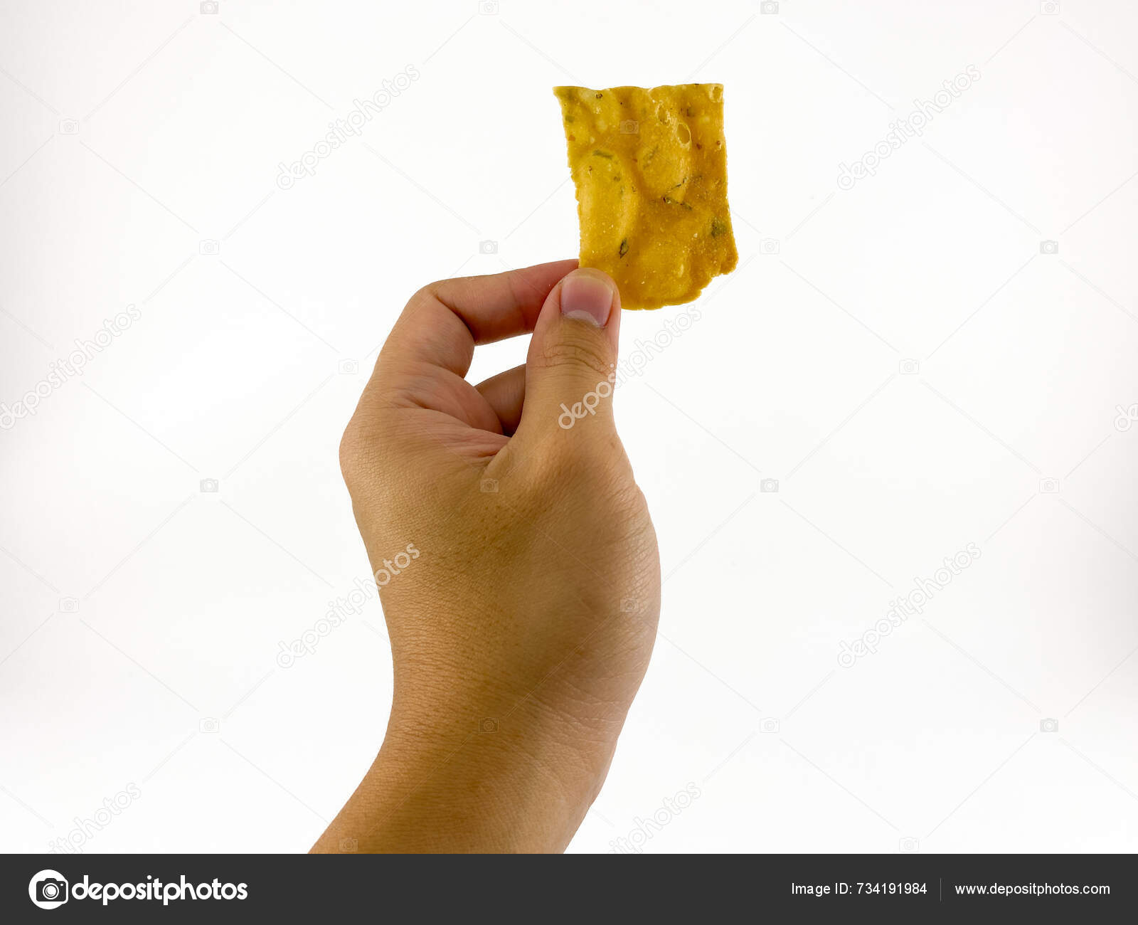 Close Hand Holding Single Tortilla Chip Front Bowl Filled Tortilla ...